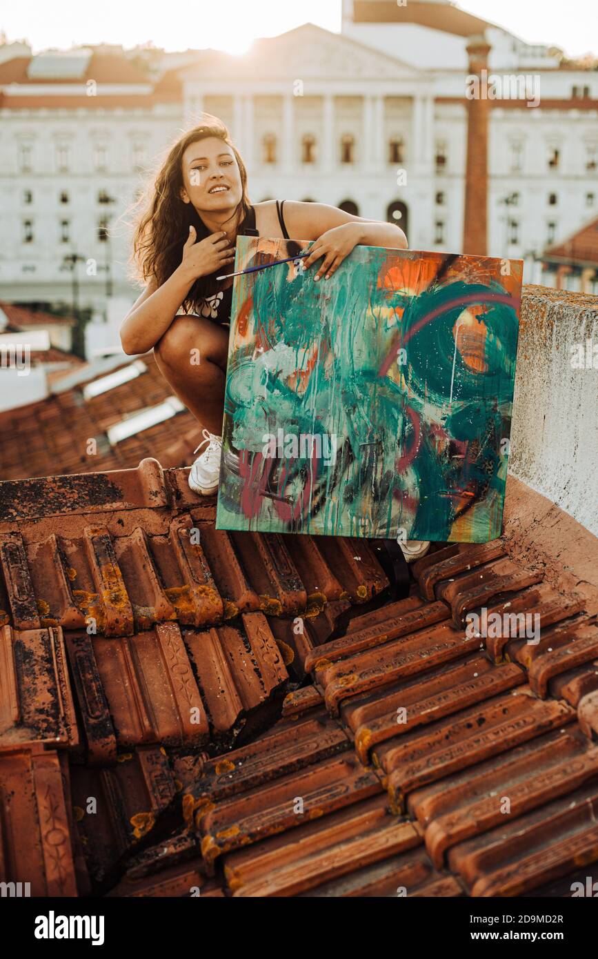 Rooftop painting hi-res stock photography and images - Alamy