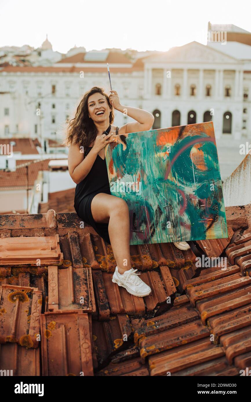 Rooftop painting hi-res stock photography and images - Alamy