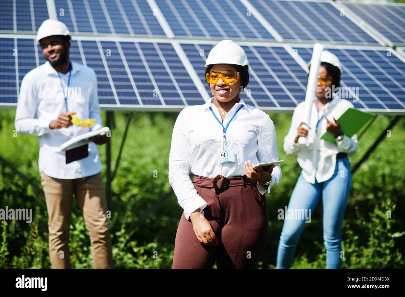 African american technician checks the maintenance of the solar panels ...