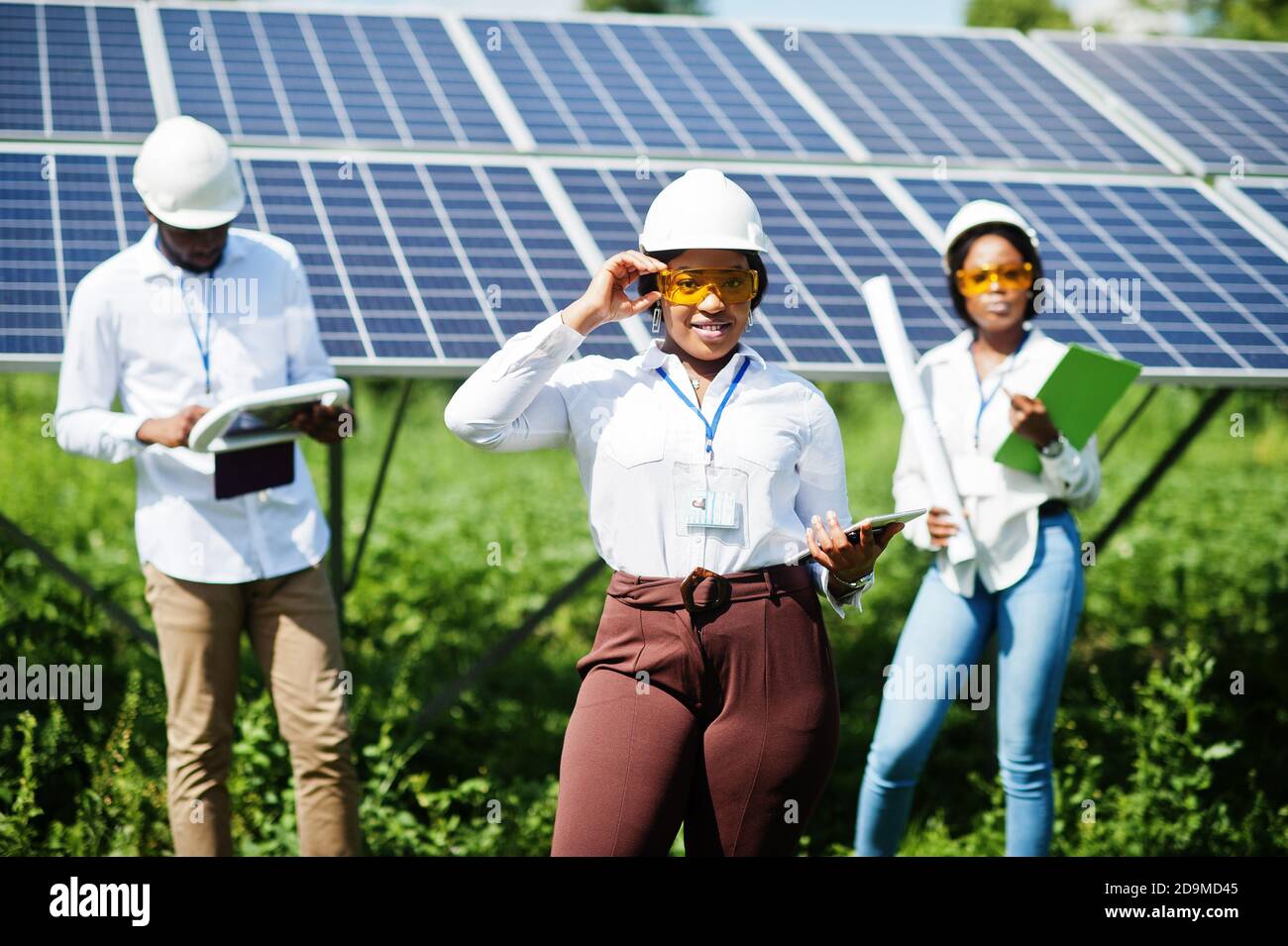 African american technician checks the maintenance of the solar panels ...