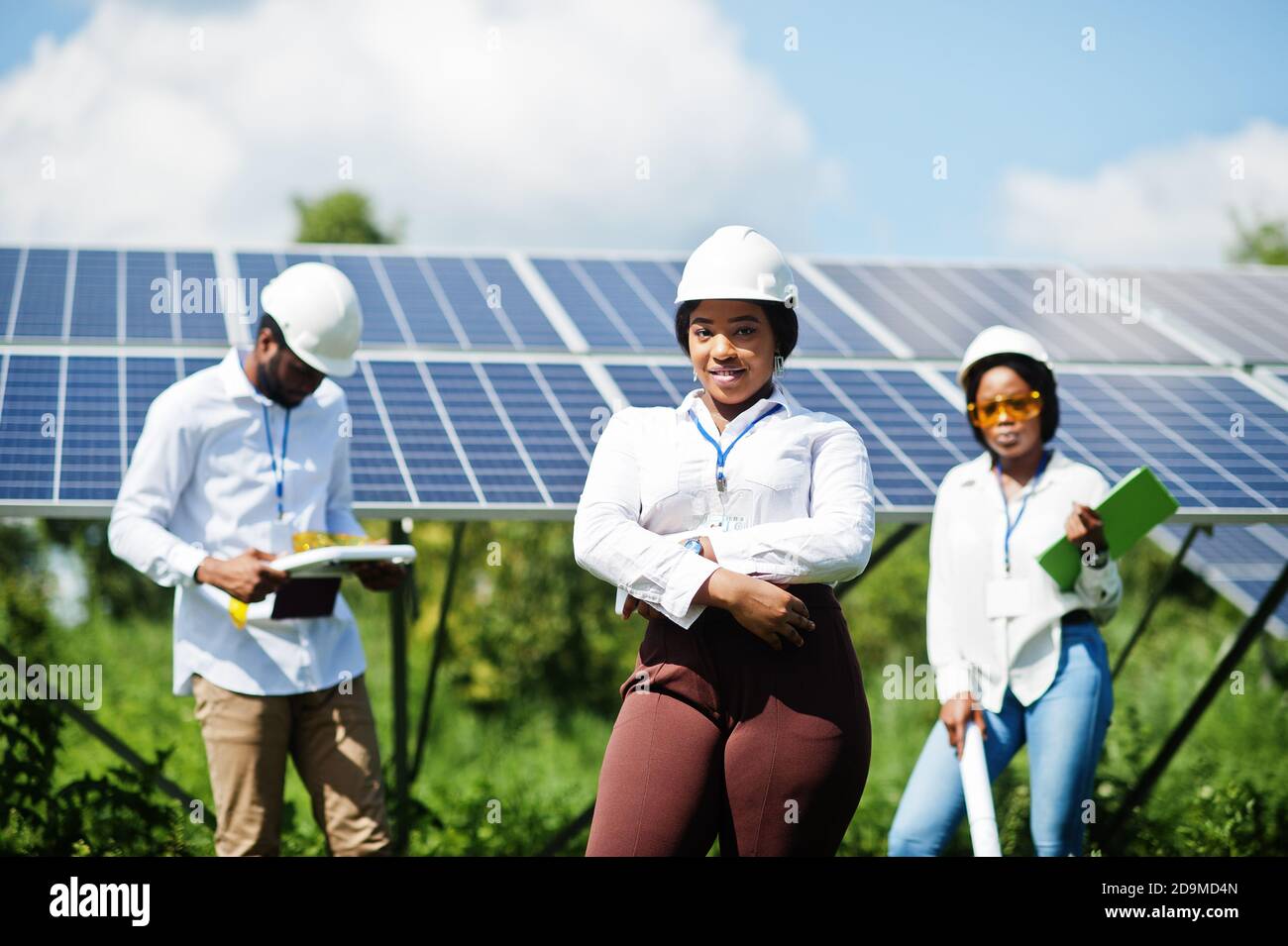 African american technician checks the maintenance of the solar panels ...
