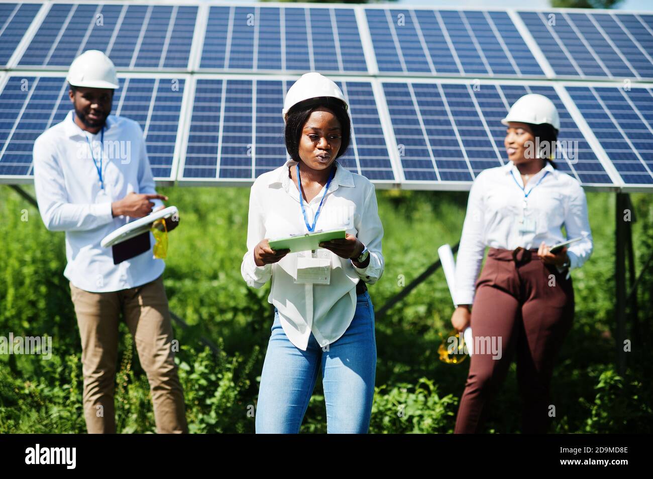 African american technician checks the maintenance of the solar panels ...