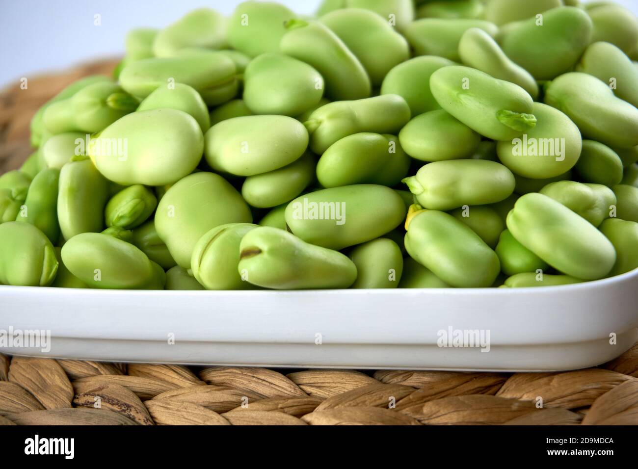 Fresh and organic raw fava, broad beans Stock Photo - Alamy