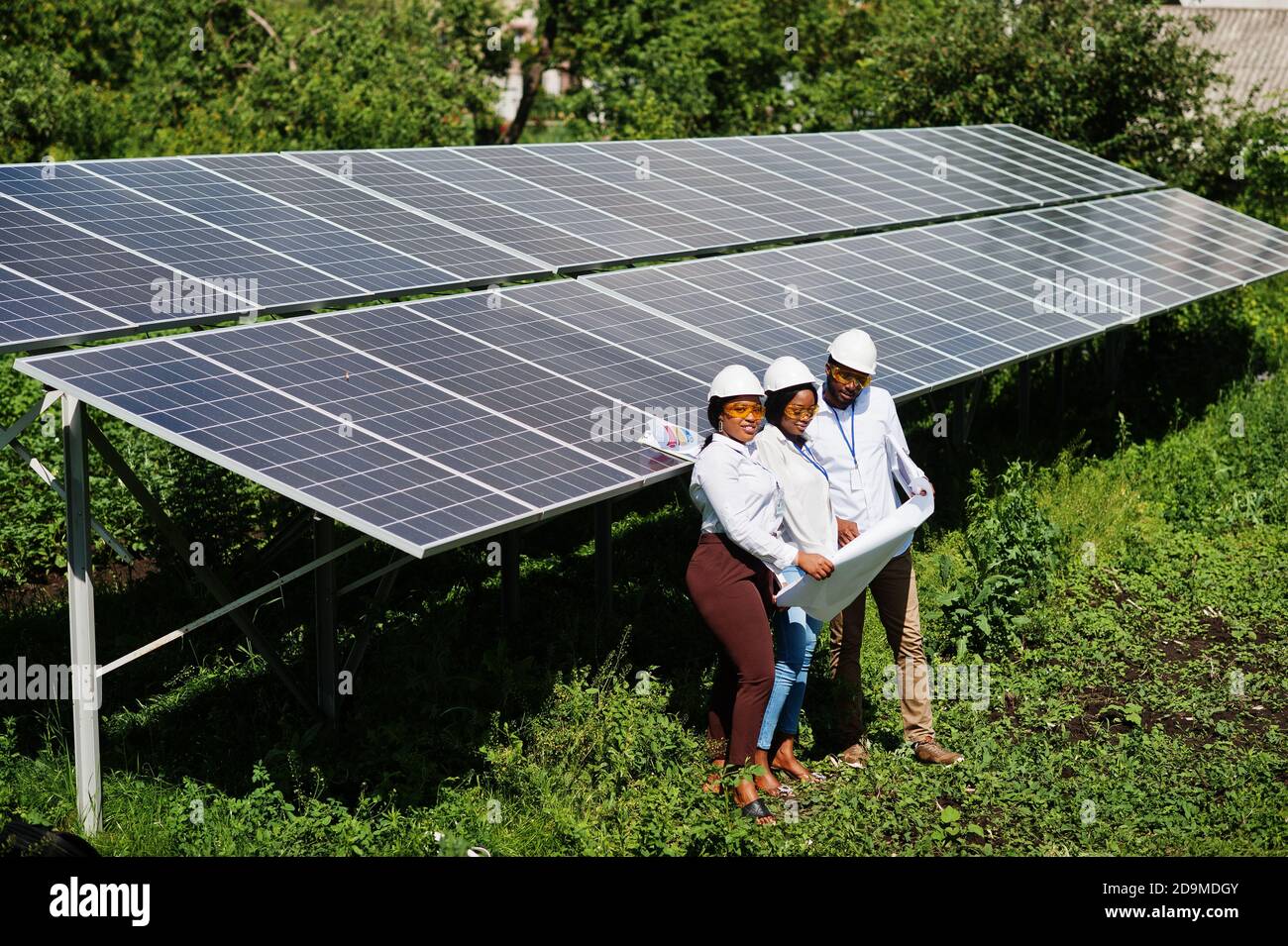 African american technician checks the maintenance of the solar panels ...