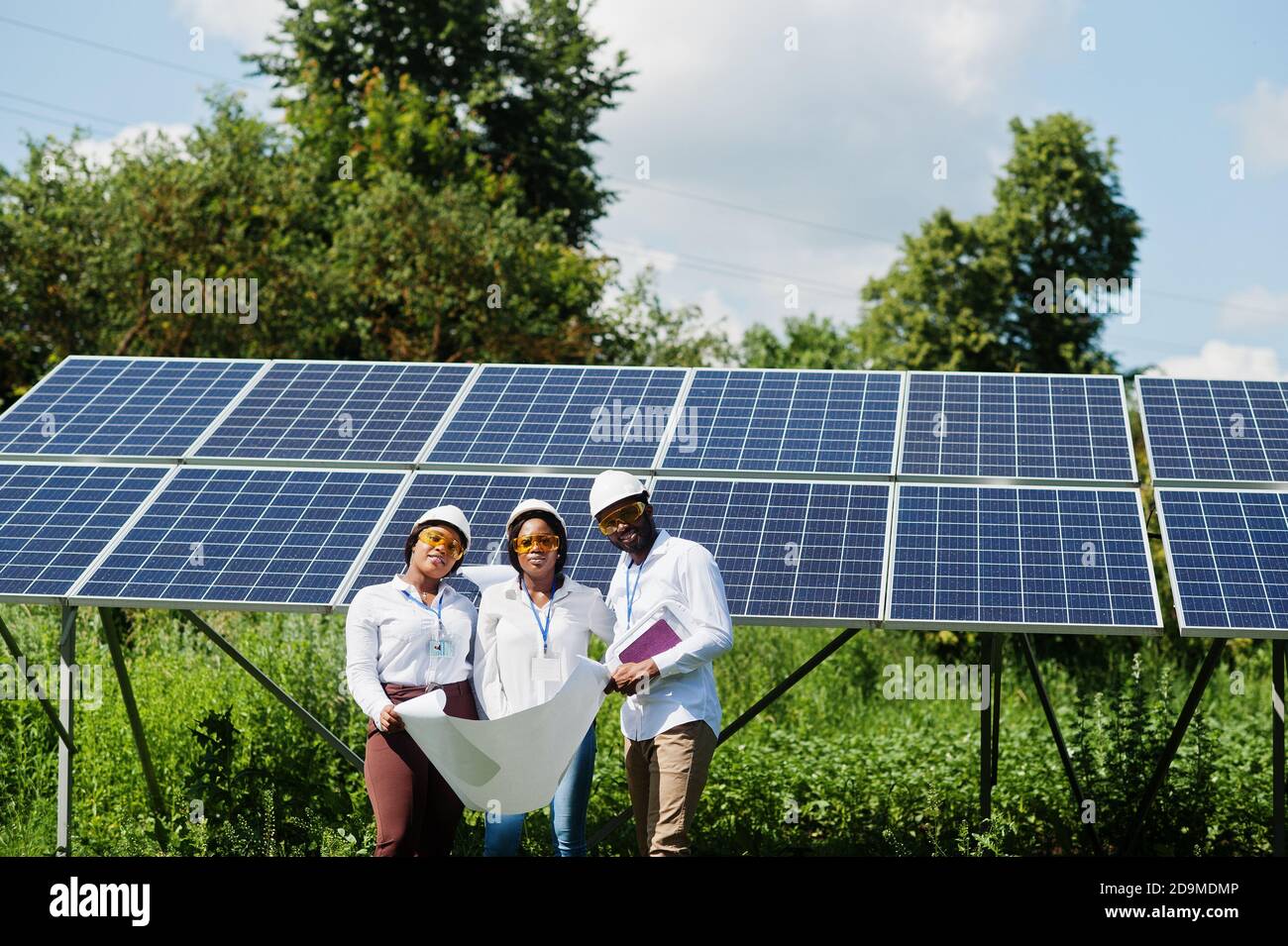 African american technician checks the maintenance of the solar panels ...