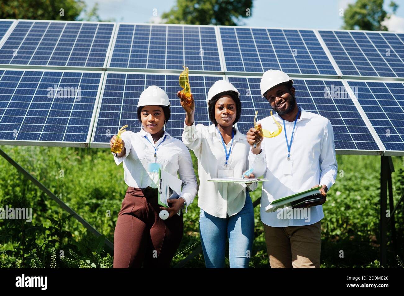 African american technician checks the maintenance of the solar panels ...