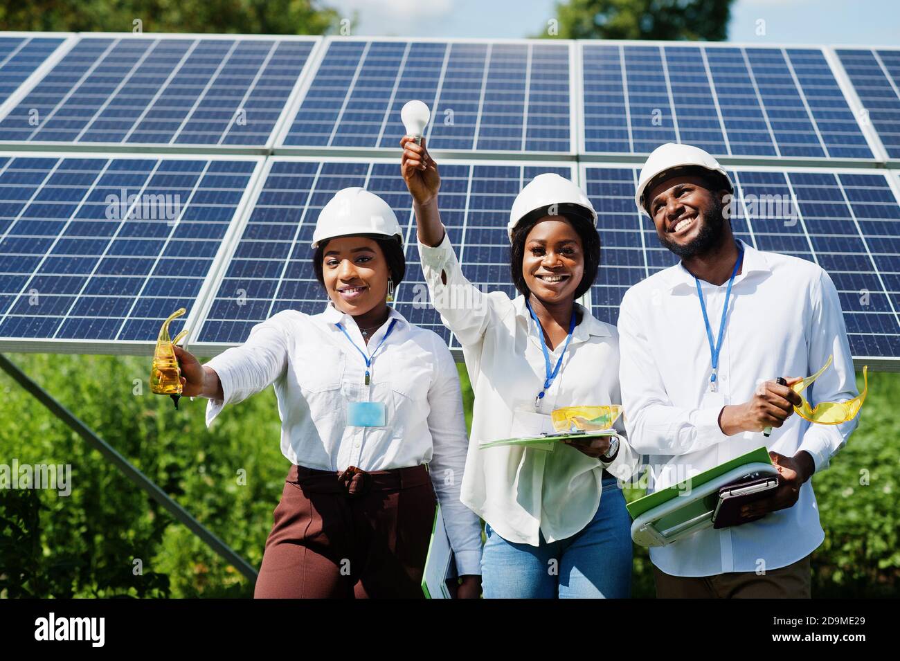 African american technician checks the maintenance of the solar panels ...