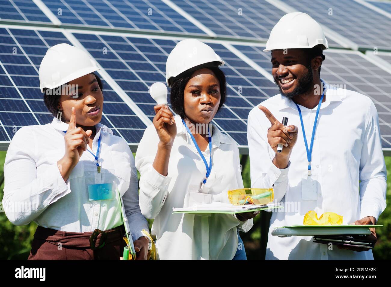 African american technician checks the maintenance of the solar panels ...