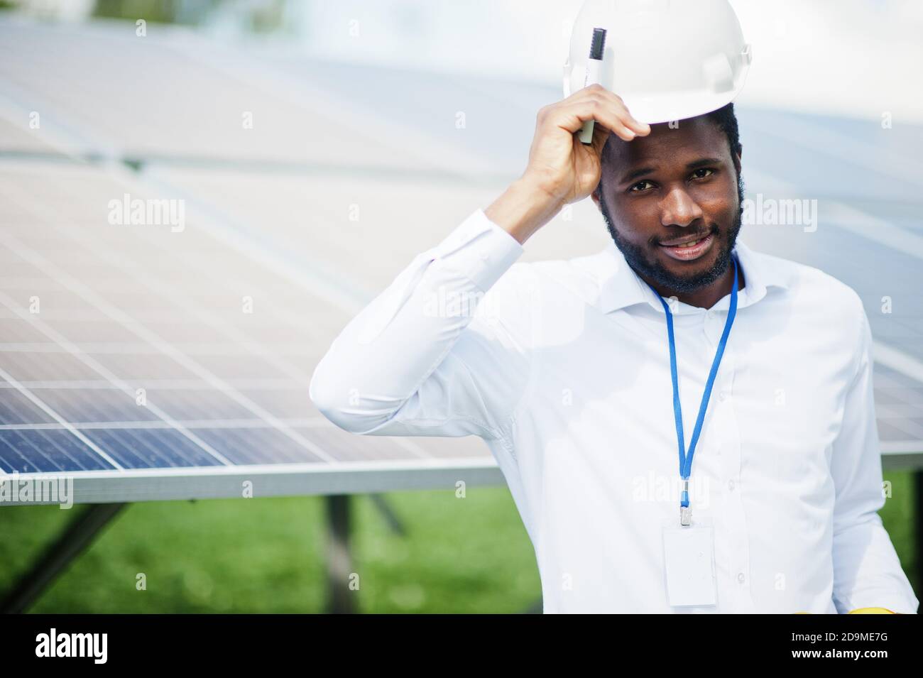 African american technician check the maintenance of the solar panels ...