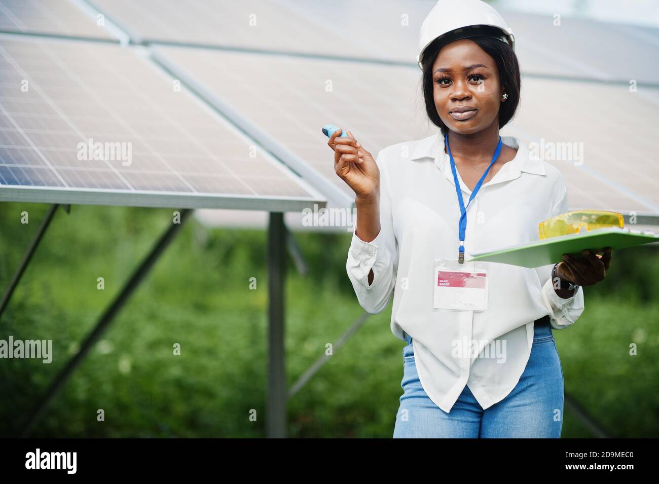 African american technician check the maintenance of the solar panels ...