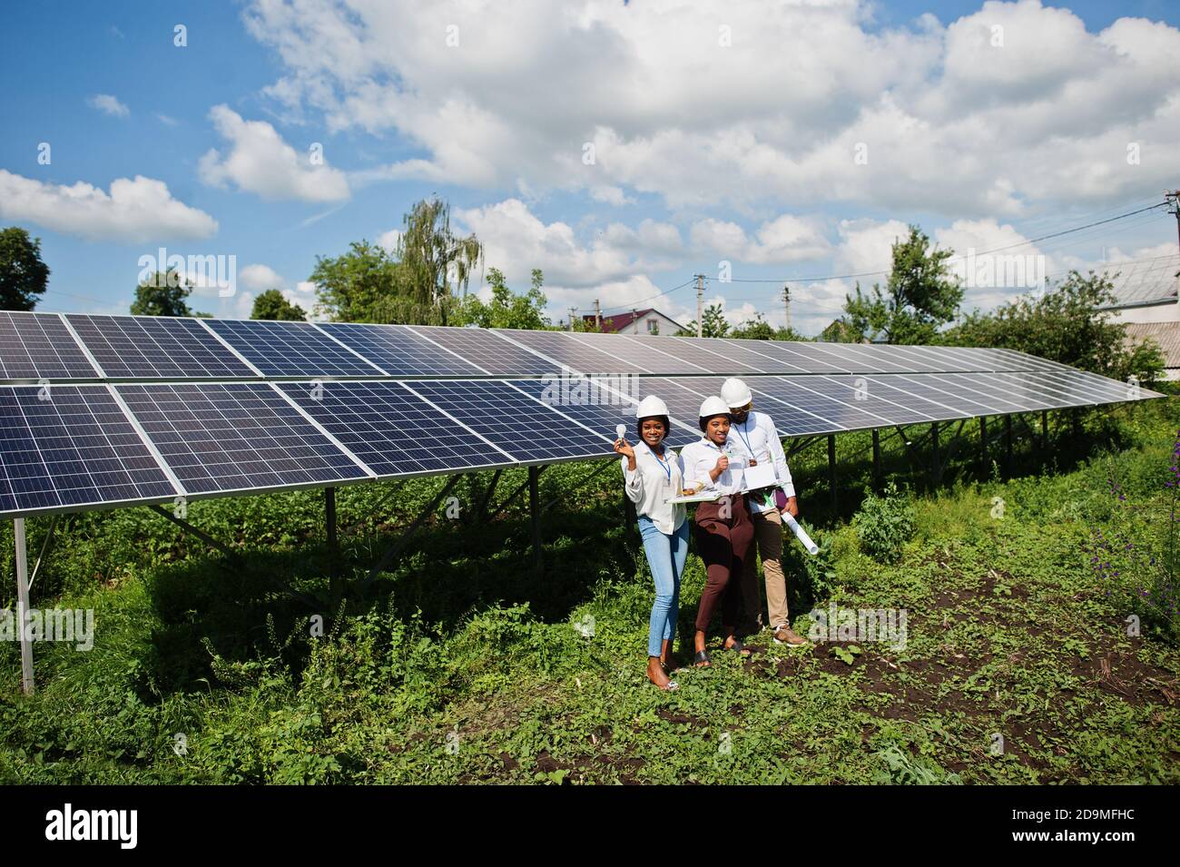 African american technician checks the maintenance of the solar panels ...