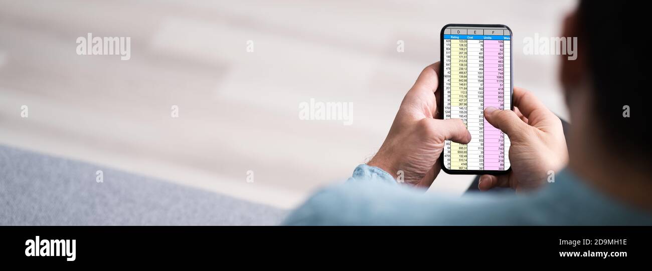 Analyst Employee Using Spreadsheet On Mobile Phone Screen Stock Photo ...