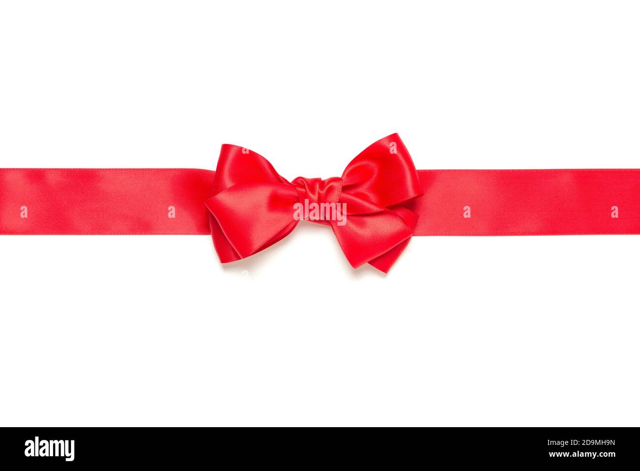 Red gift bow and horizontally crossed red ribbon isolated on white ...