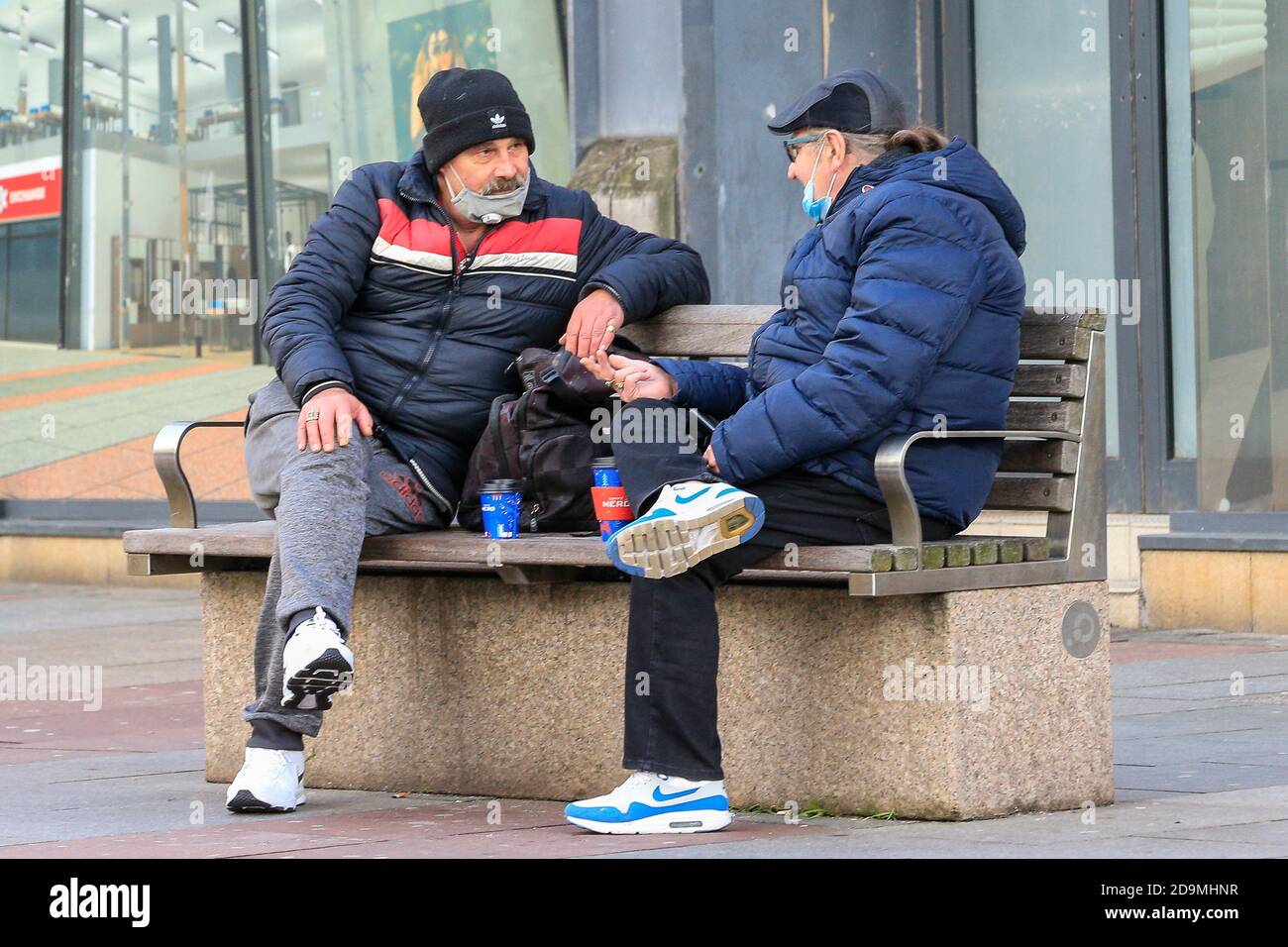 Two People Talking Outside
