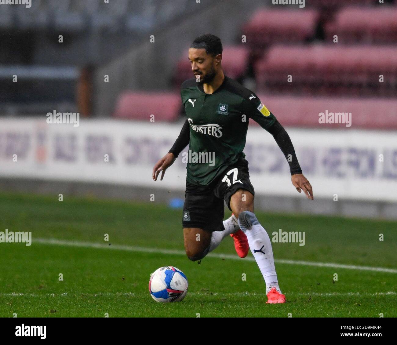 Byron Moore (17) of Plymouth Argyle with the ball Stock Photo - Alamy
