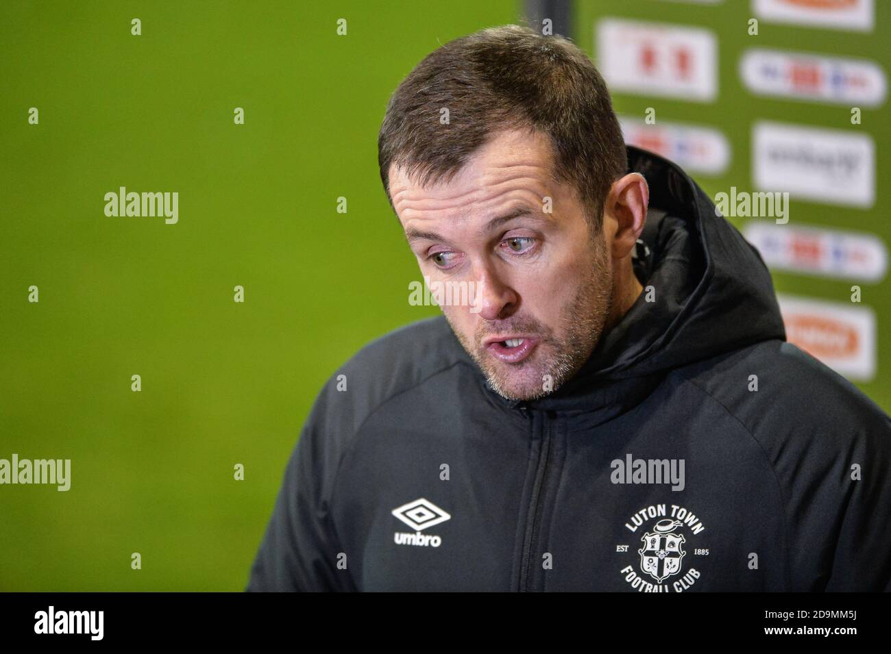 Nathan Jones manager of Luton Town talks to media Stock Photo - Alamy