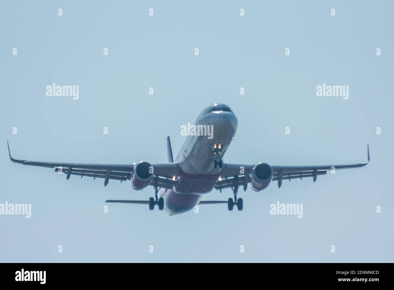 An airplane in flight Stock Photo - Alamy