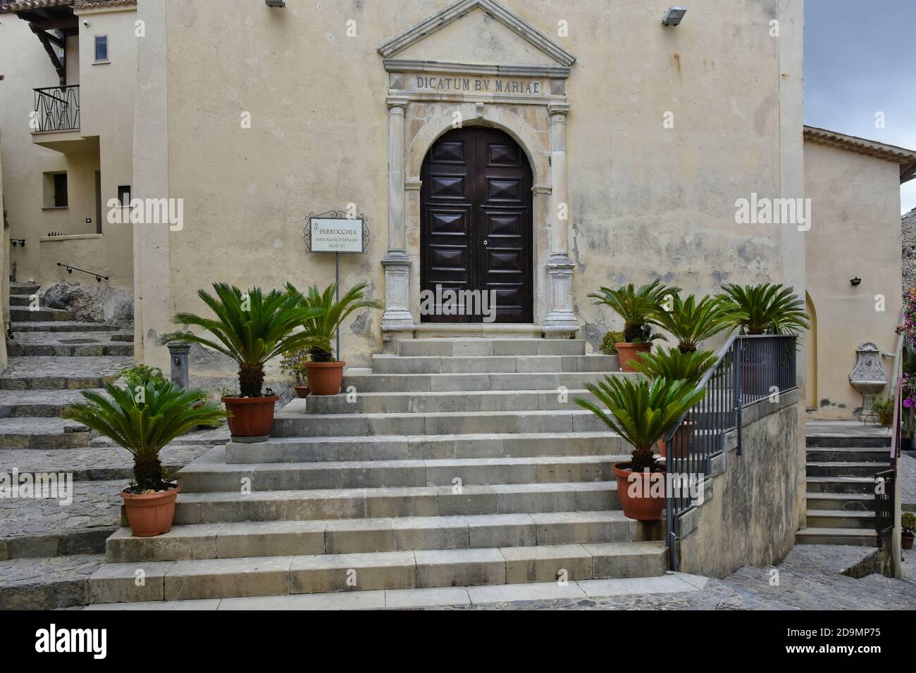 A narrow street among the old houses of Scalea, a rural village in the ...