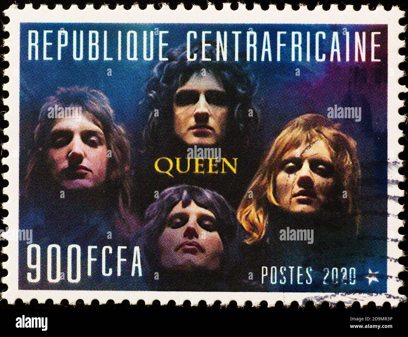 Four members of band the Queen on stamp Stock Photo - Alamy