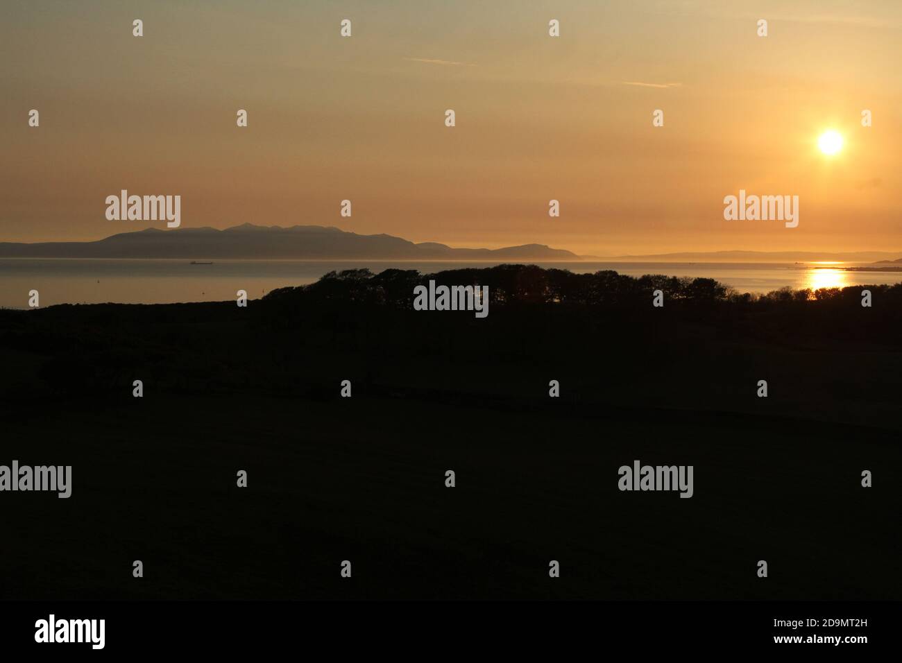 Sunset Ayrshire & Arran from nr Dundonald Stock Photo - Alamy