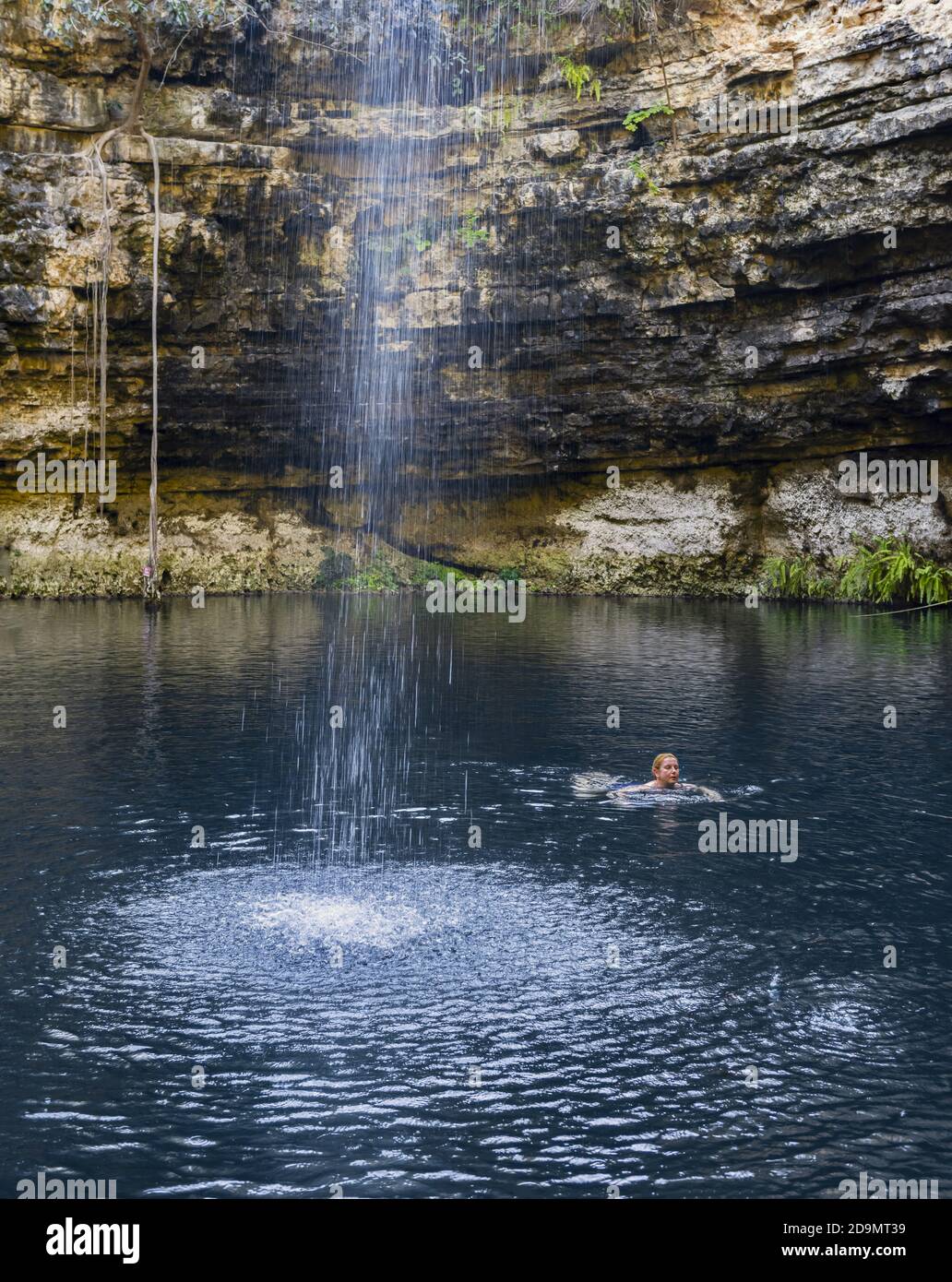 Person swimming in cenote hi-res stock photography and images - Alamy