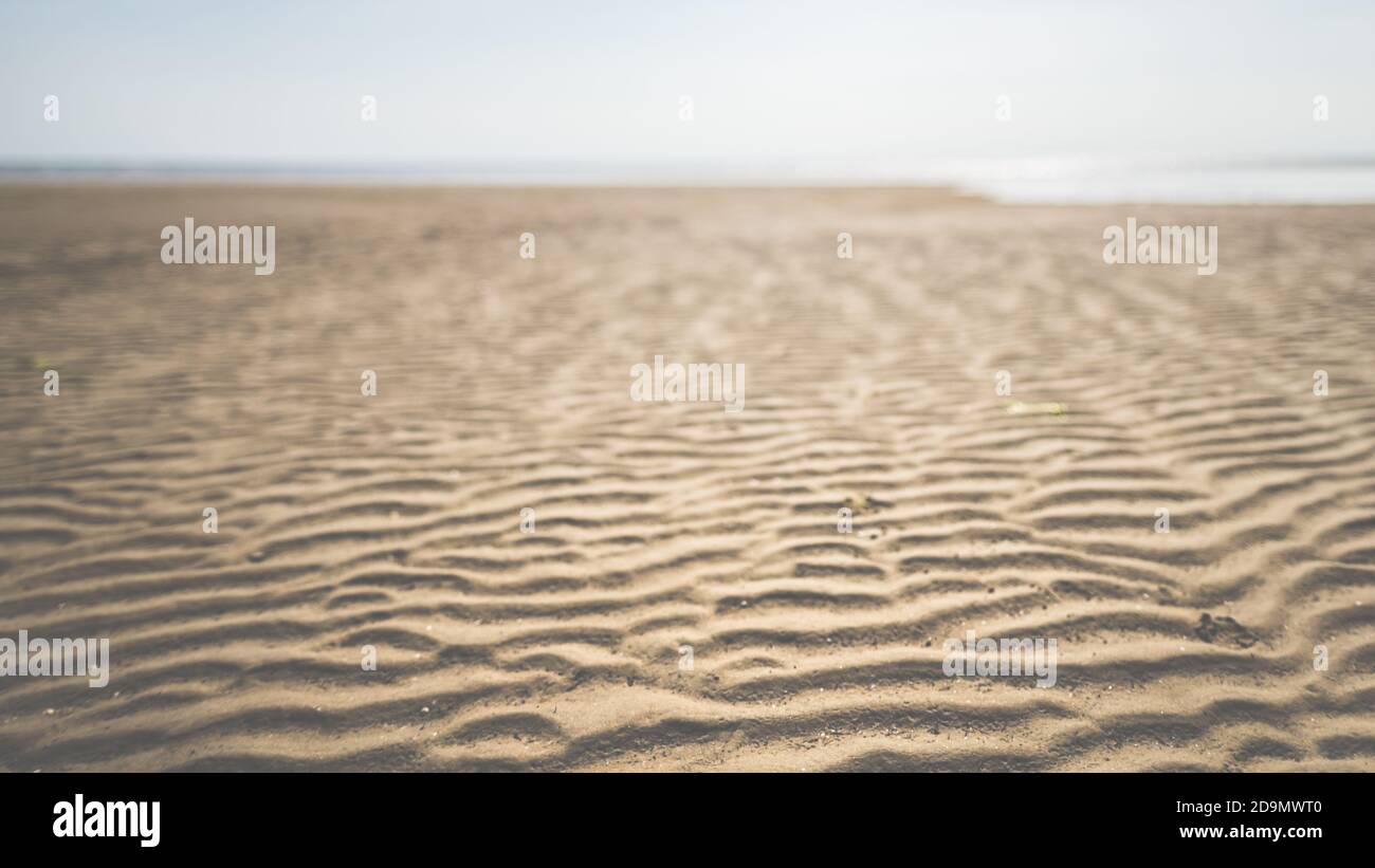 The sand and the sea - ebb and water - light and shadow - wave patterns ...