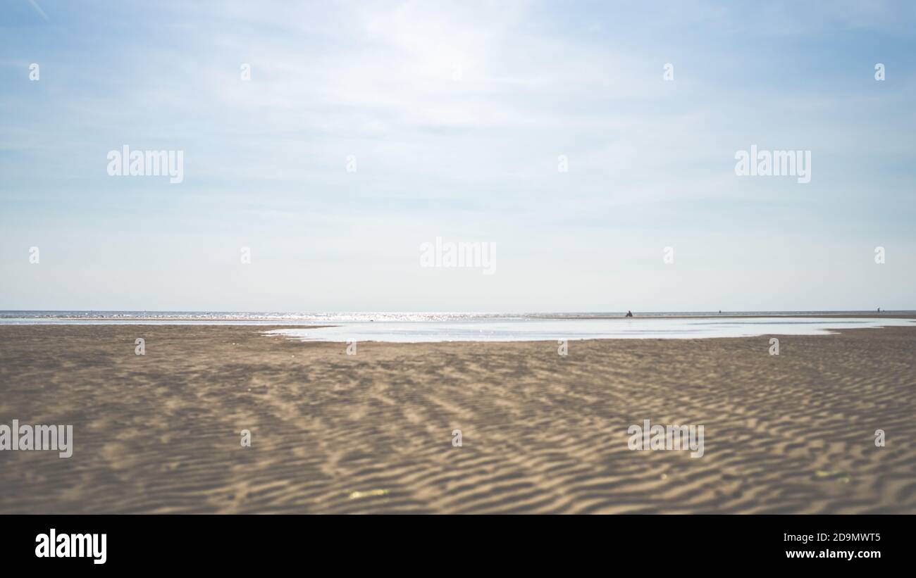 The sand and the sea - ebb and water - light and shadow - wave patterns ...
