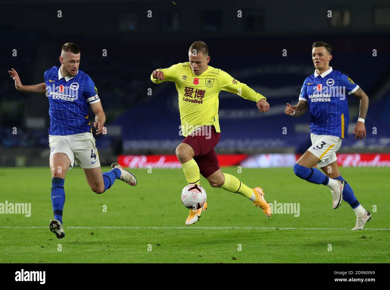 Brighton and Hove Albion's (left-right) Adam Webster, Burnley's Matej ...