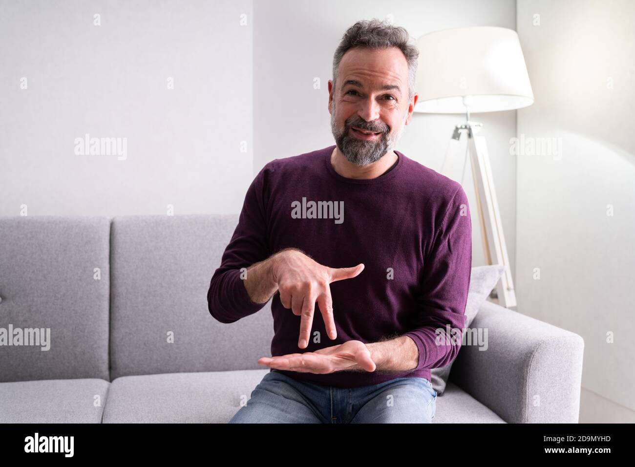 Senior Learning Sign Language For Deaf Disabled Stock Photo - Alamy