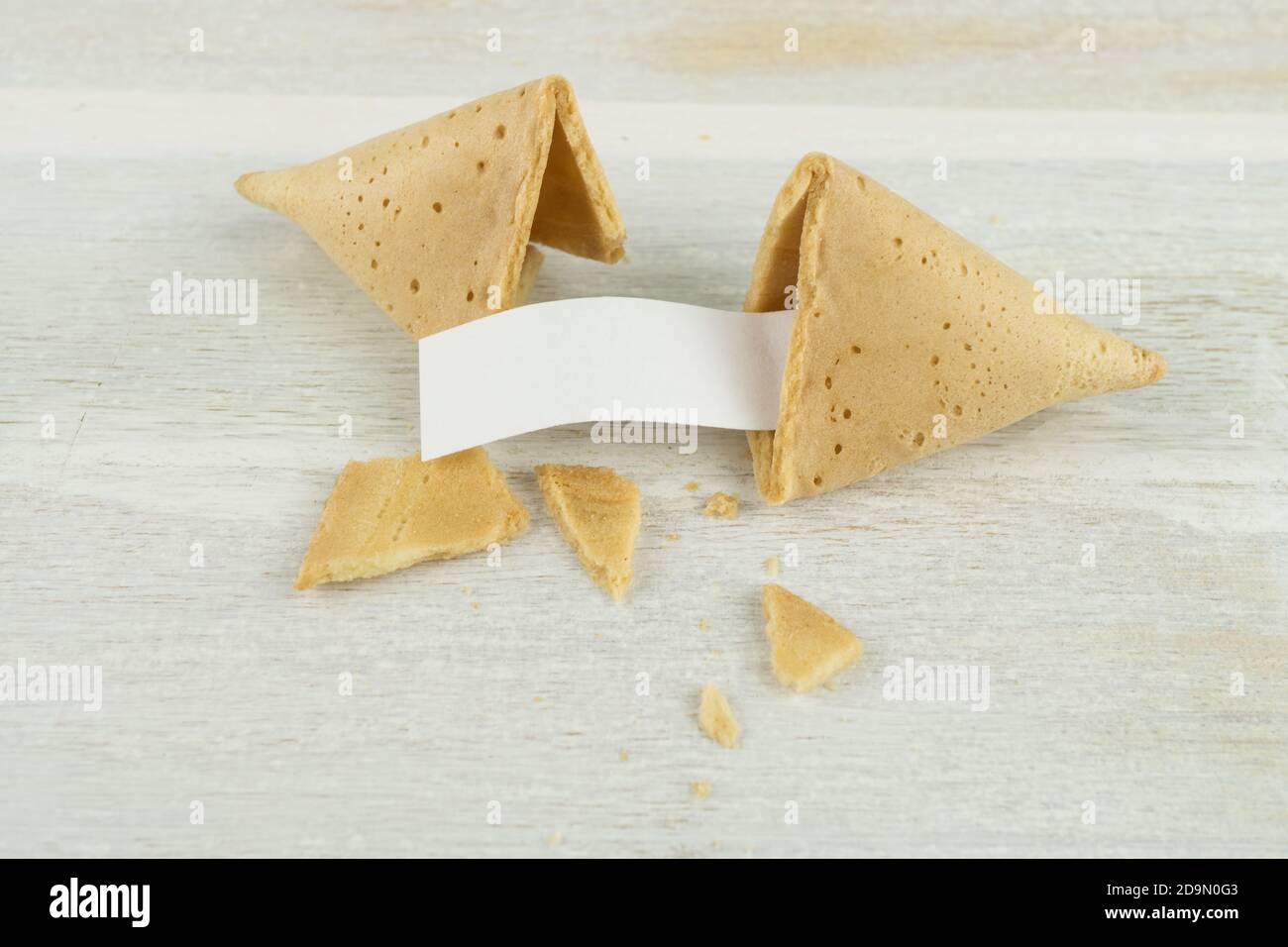 Fortune cookie with blank label, wooden background Stock Photo - Alamy
