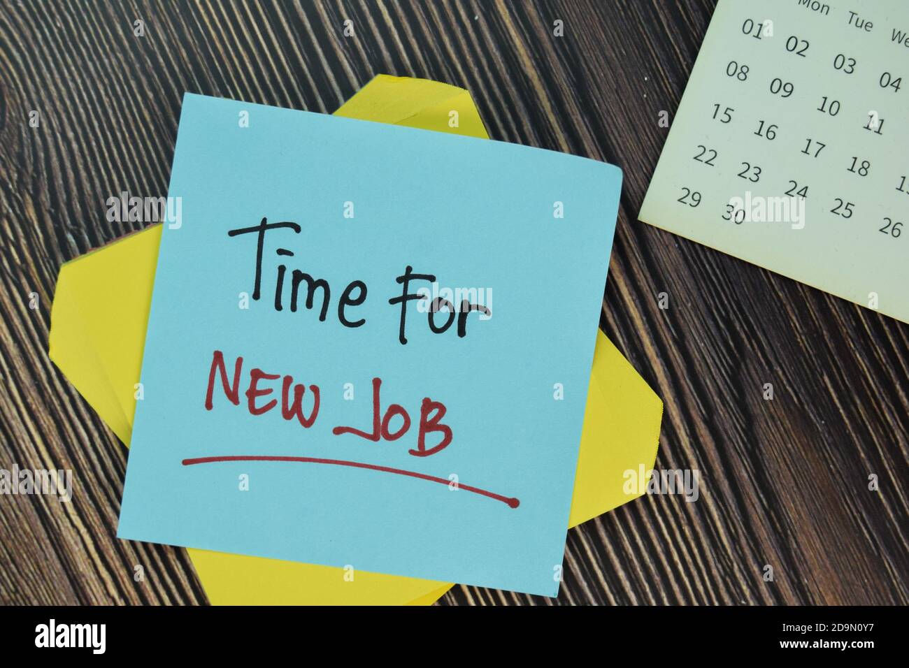 Time For New Job write on sticky note isolated on Wooden Table ...