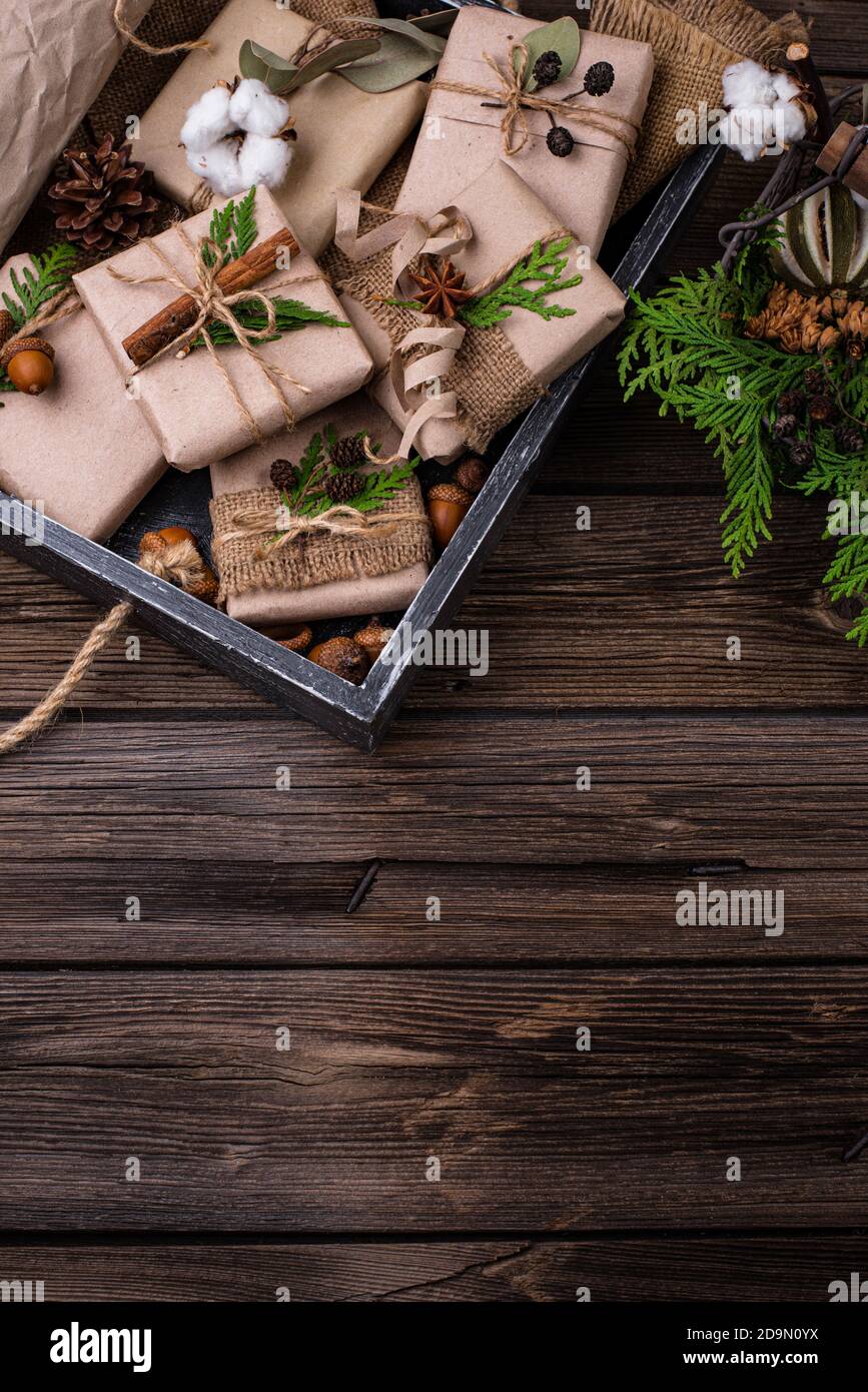 Christmas gift boxes in craft paper Stock Photo - Alamy