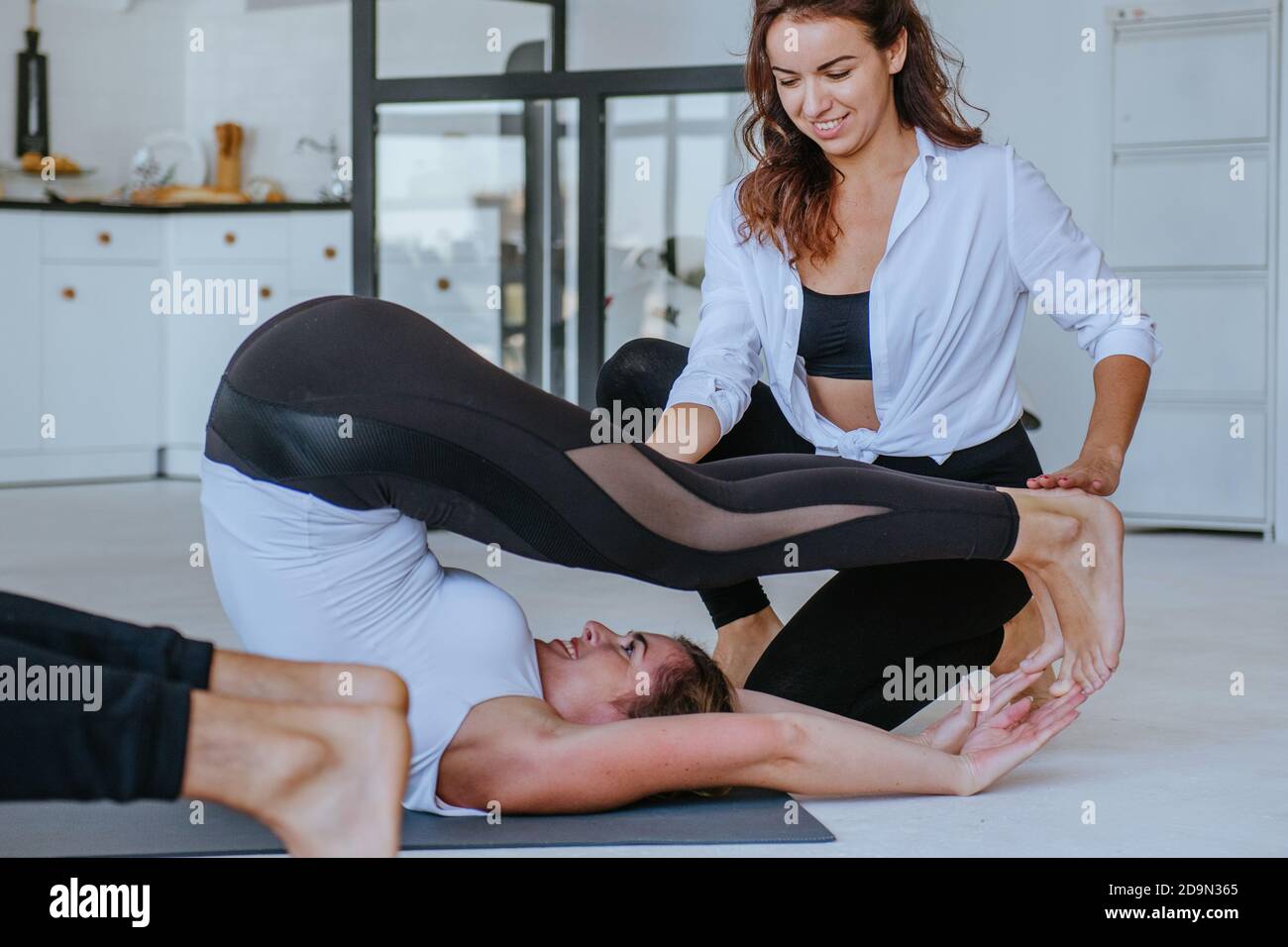 Woman coach helping young hi-res stock photography and images - Alamy