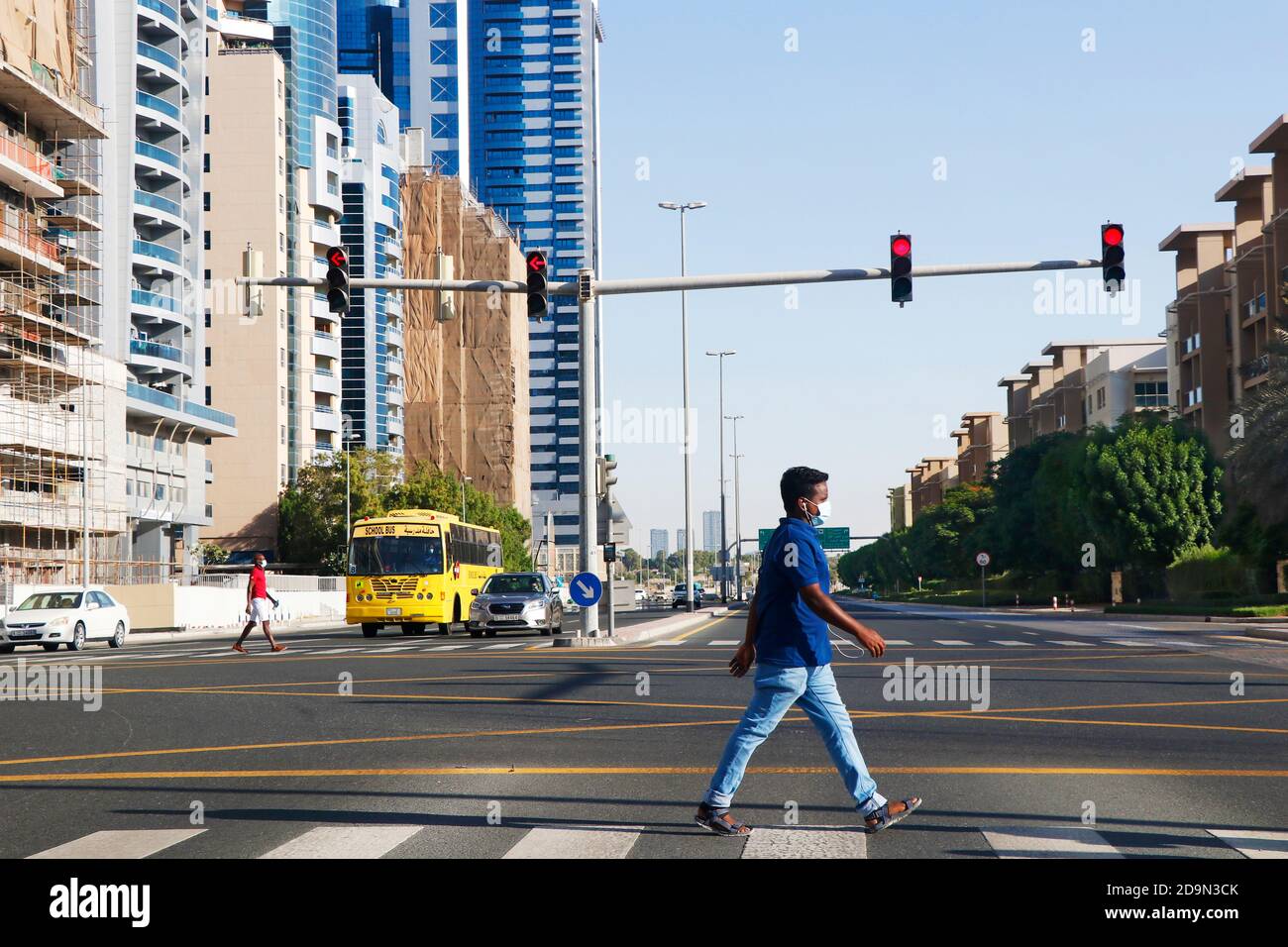 Women walking on pavement dubai hi-res stock photography and images - Alamy