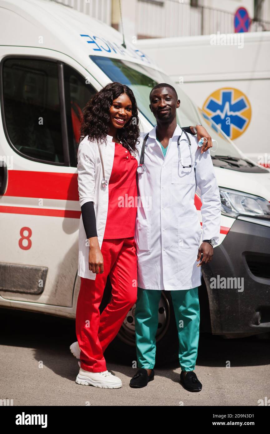 Two african paramedic ambulance emergency crew doctors Stock Photo - Alamy