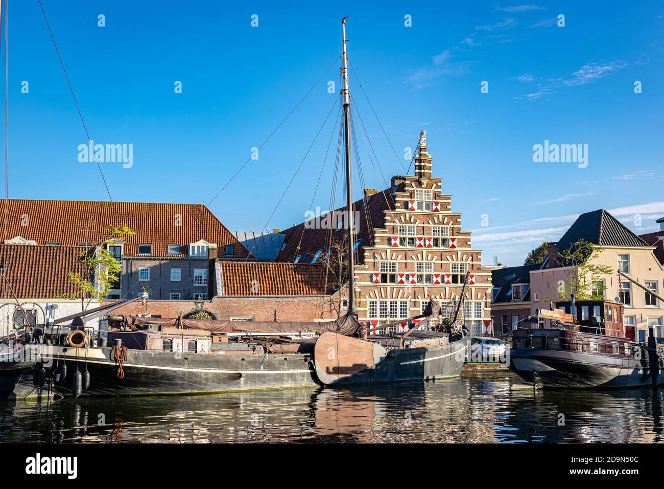 Scenic view of traditional dutch canal house and boats in Oude Rijn ...