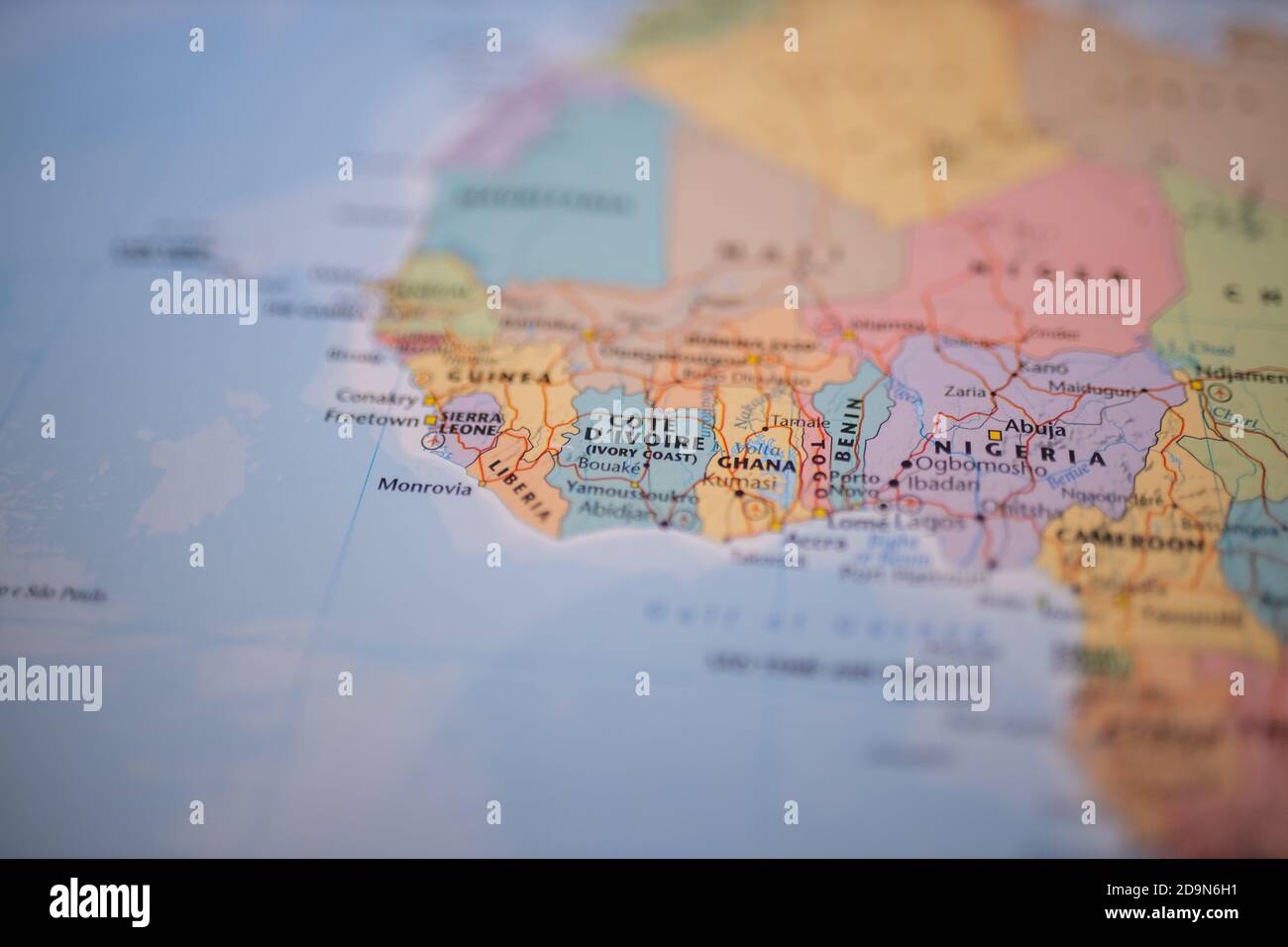 Ivory Coast on a colorful and blurry map of Africa with its main routes ...