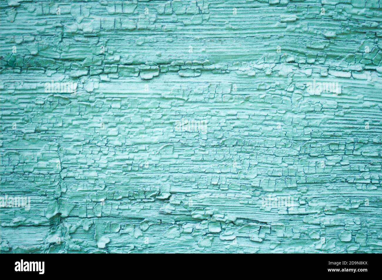 Many layers of peeling paint. Grainy painted mint surface, beautiful ...
