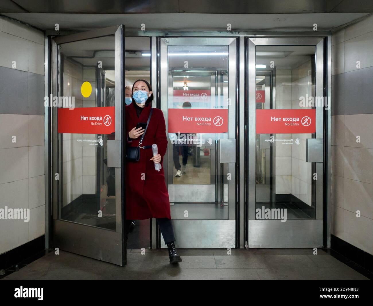 Moscow. Russia. October 26, 2020 Passengers wearing face masks leave ...