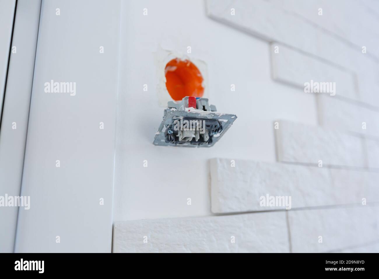 Electrical outlet during installation in office wall Stock Photo - Alamy