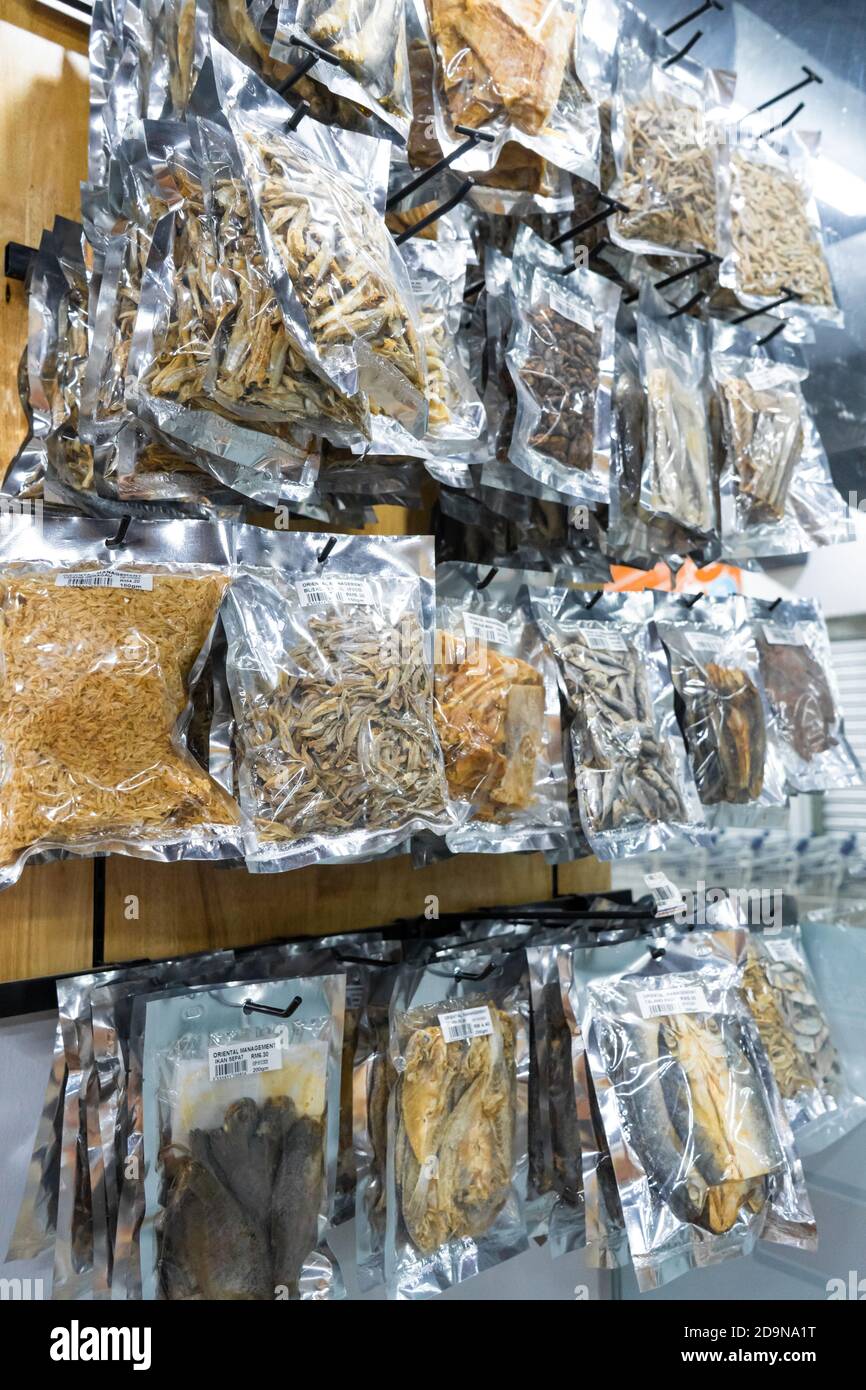 Showcase with dried fish at a grocery store Stock Photo - Alamy