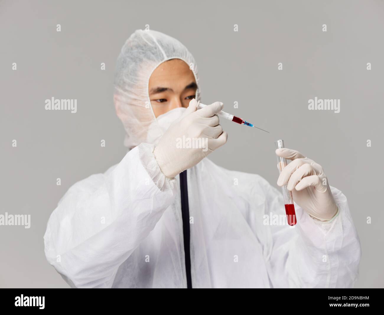male laboratory assistant research medication injection treatment Stock ...