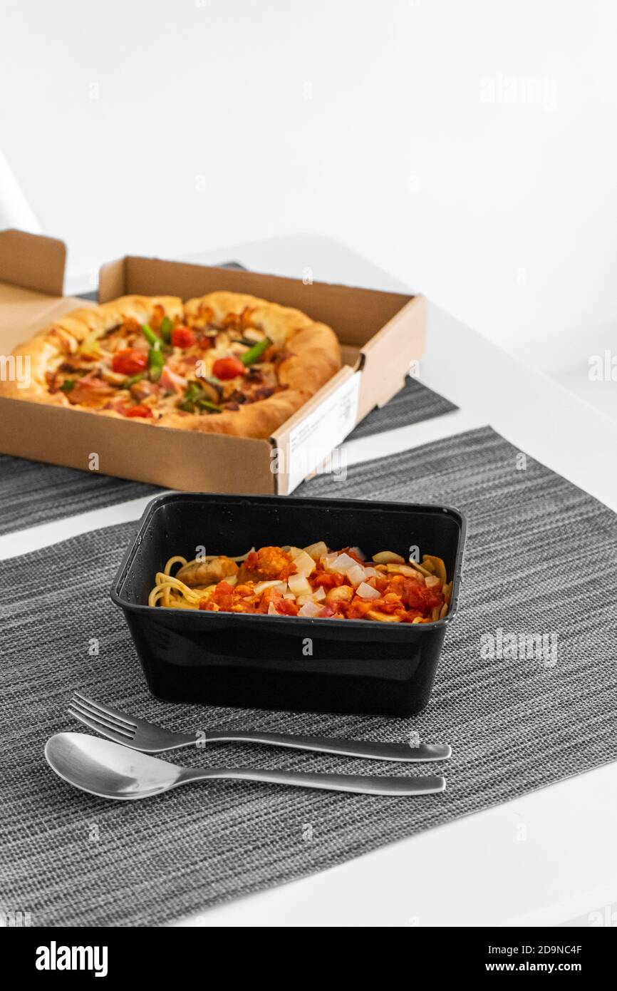 Set lunch, pizza with pasta. Food delivery Stock Photo - Alamy