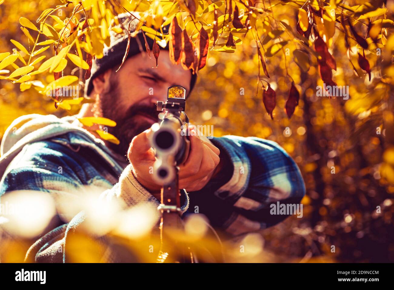 Close up snipers carbine at the outdoor hunting. Hunter with shotgun ...