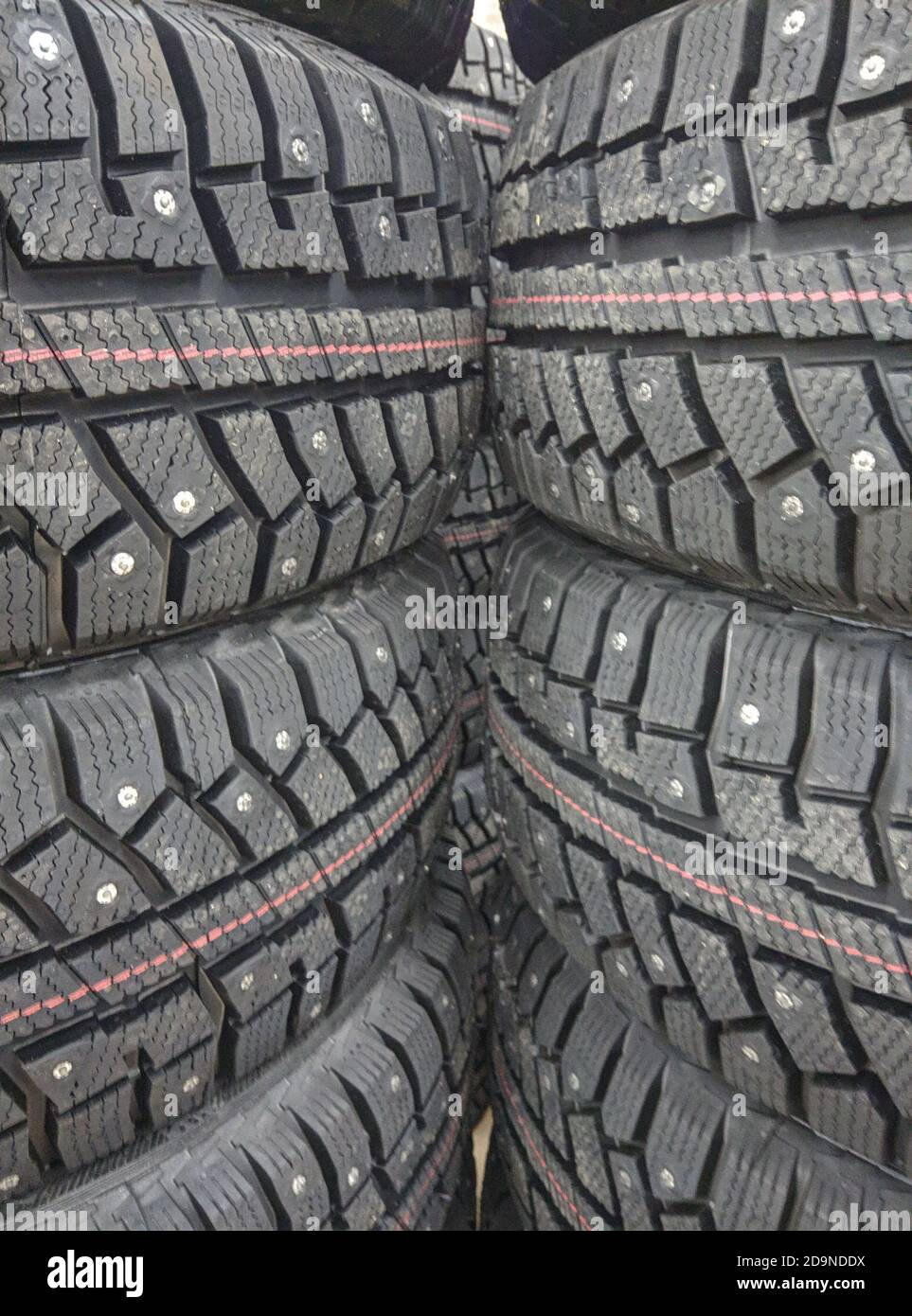 Studded tire on a background winter studded tires for a car new close ...