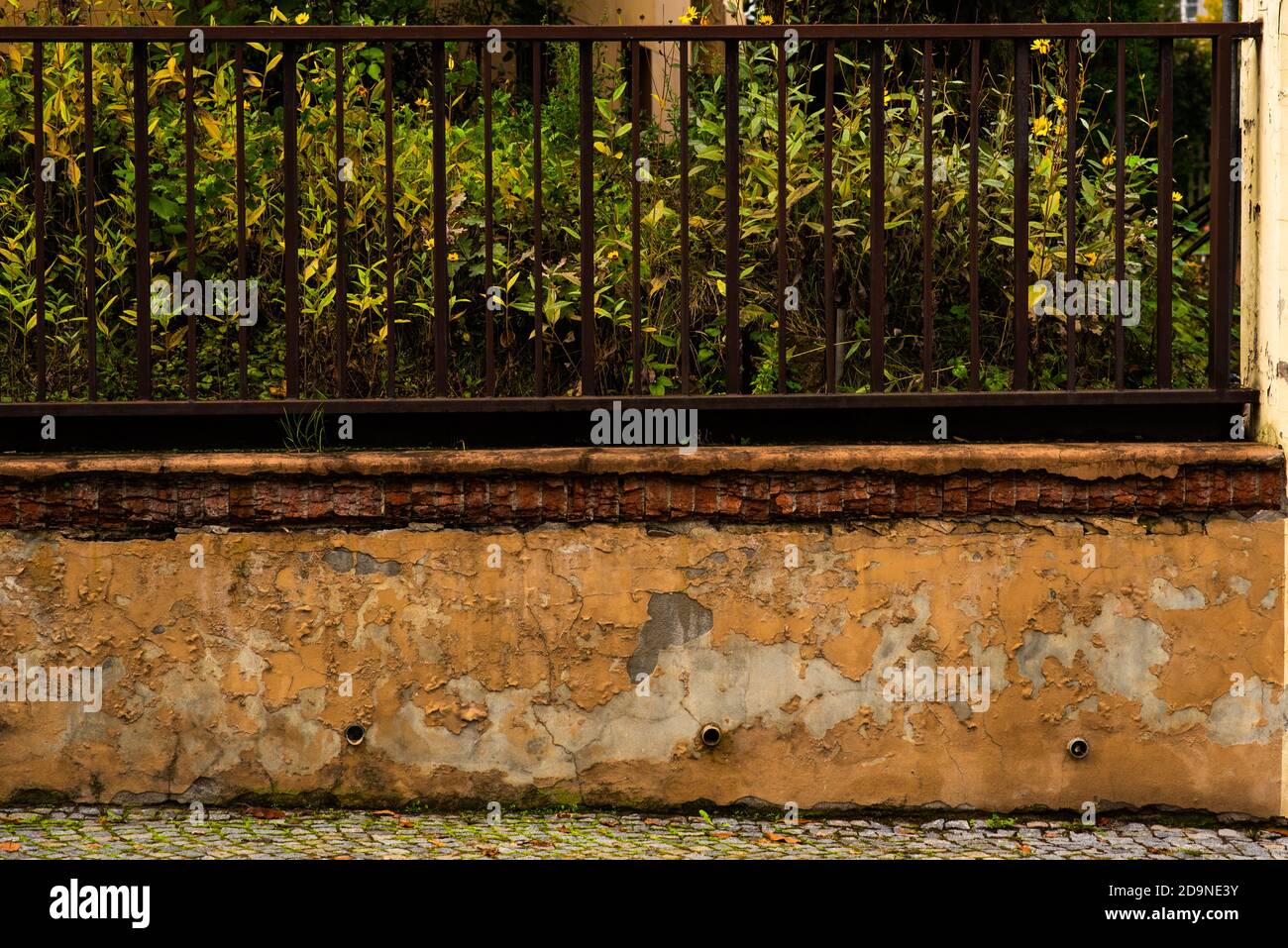Rotten fence surrounding a house in the city Stock Photo - Alamy