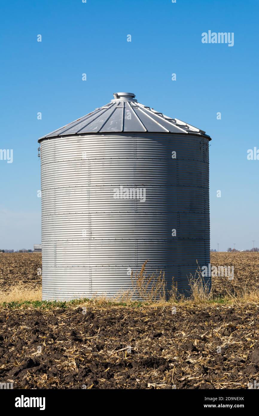 Metal silo in open field Stock Photo - Alamy