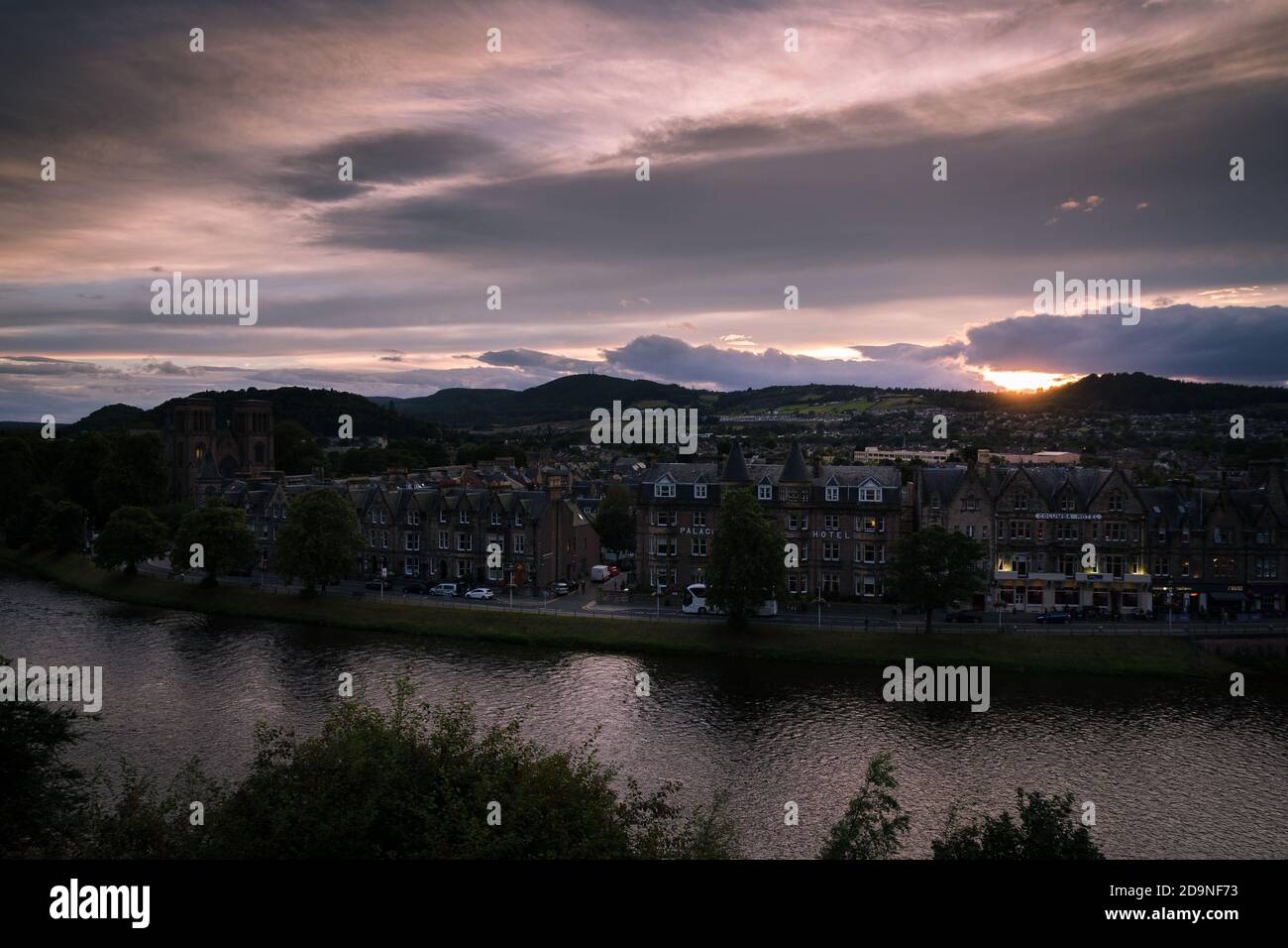 Inverness city landscape with the illumnated city and its reflection in ...