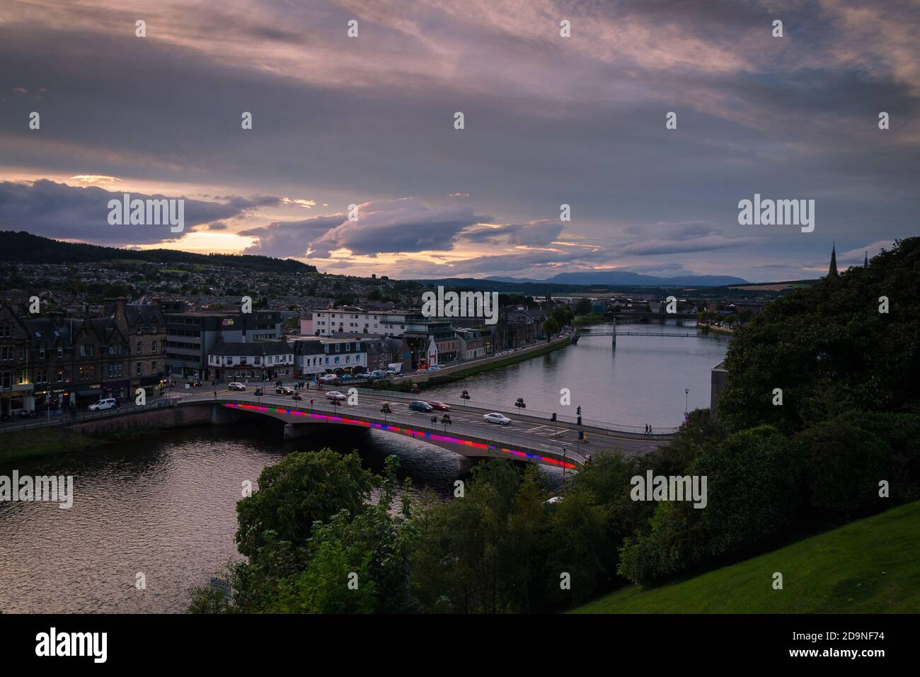 Inverness city landscape with the illumnated city and its reflection in ...