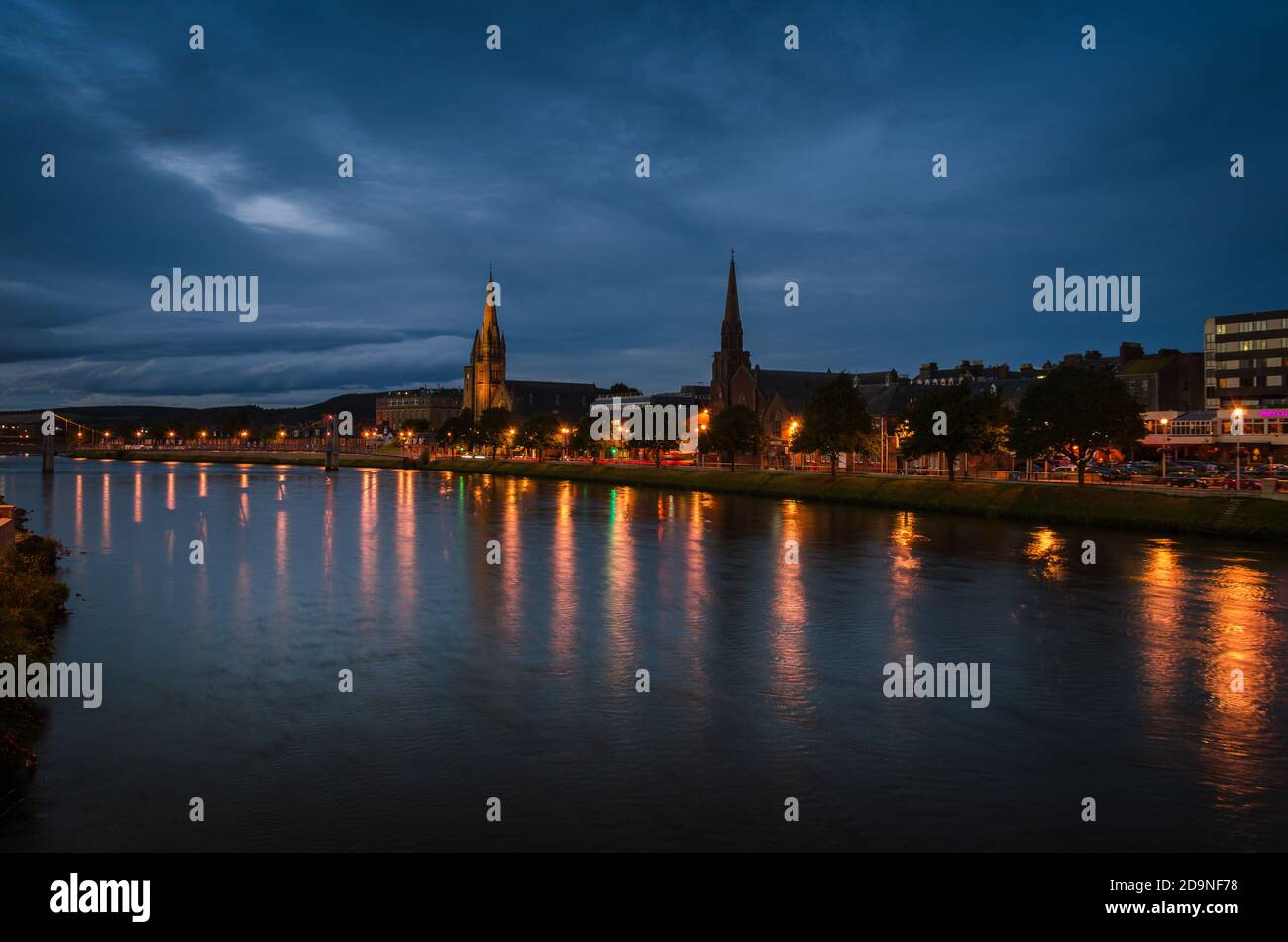 Inverness city landscape at night with the lights reflected in the ...